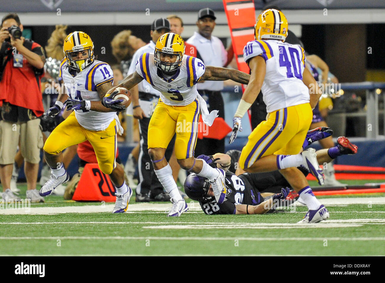 Aug. 31,2013:.LSU Tigers running back Terrence Magee (14) blocks for ...