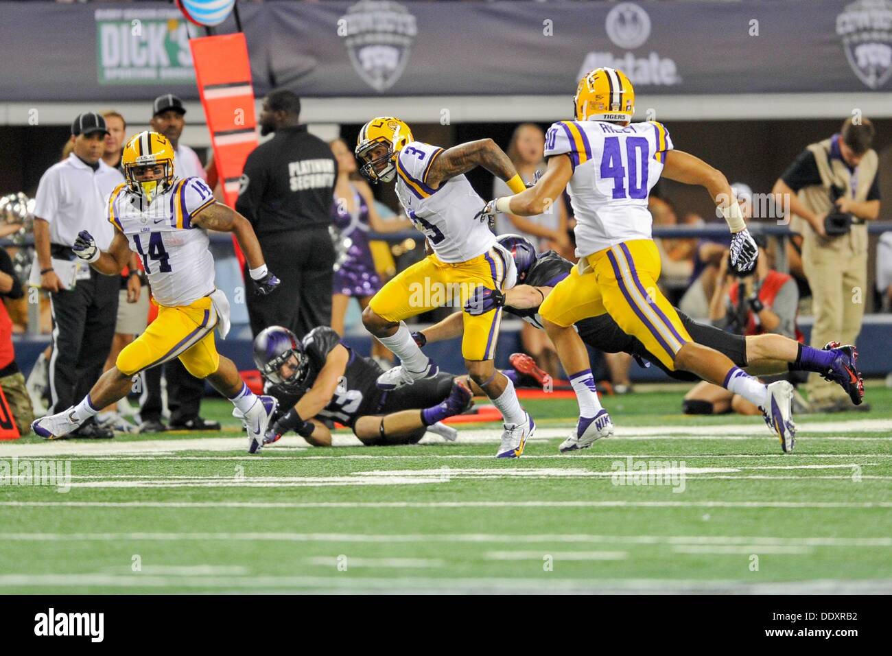 Aug. 31,2013:.LSU Tigers running back Terrence Magee (14) blocks for ...