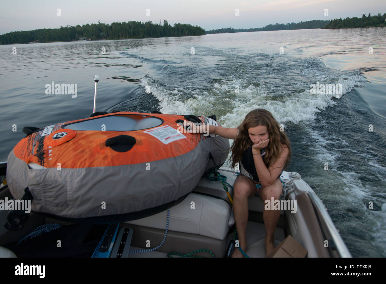 Girl on inflatable boat hi-res stock photography and images - Alamy