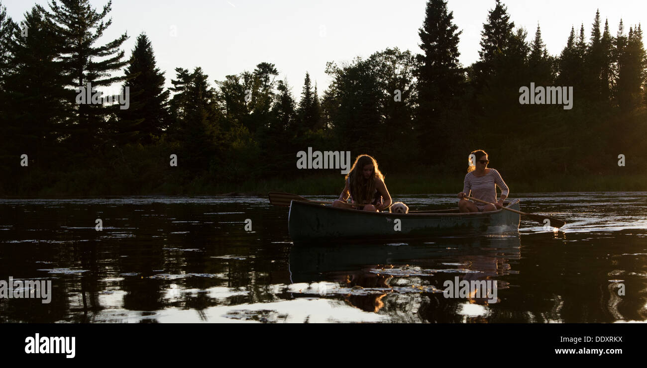 Two girls rowing boat in hi-res stock photography and images - Alamy