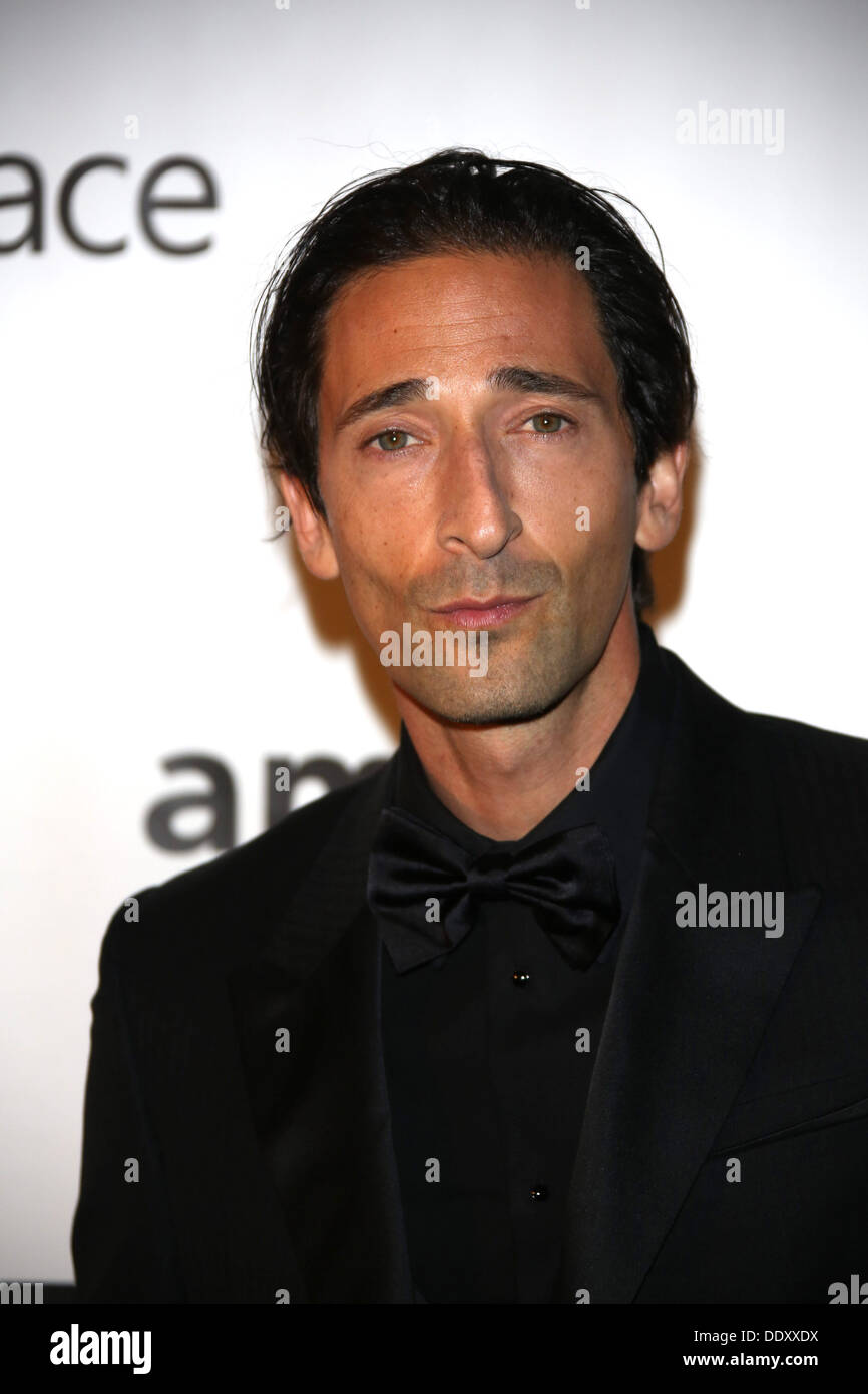Toronto, Canada. 8th Sep, 2013. Actor Adrien Brody attends the amfAR ...