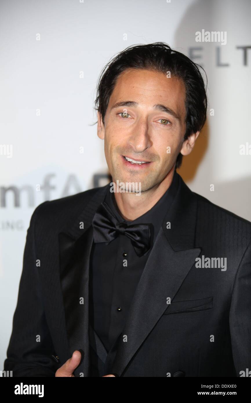 Toronto, Canada. 8th Sep, 2013. Actor Adrien Brody attends the amfAR ...