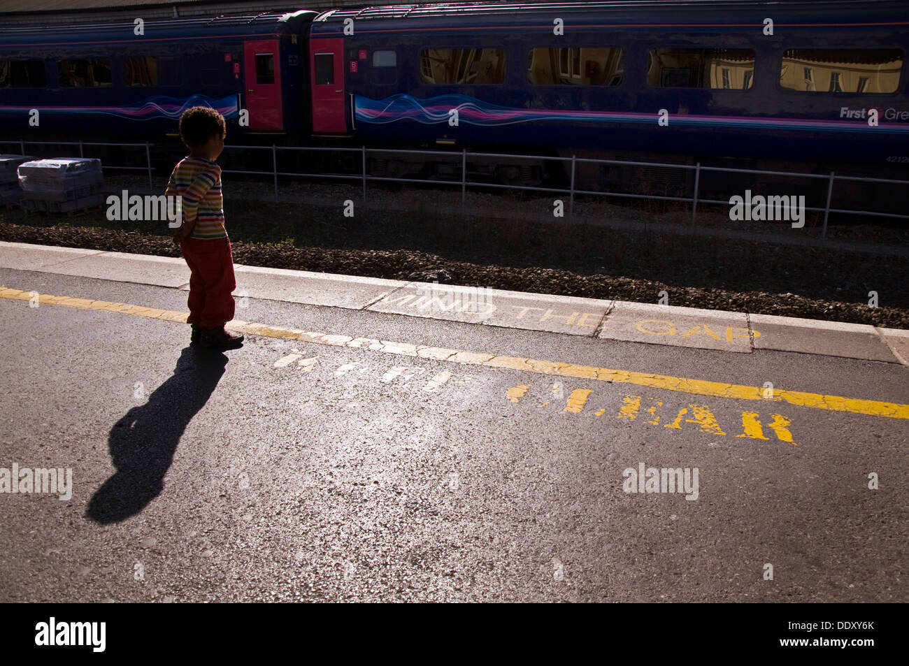 Child watching train at Bath Spa station Somerset England Stock Photo ...