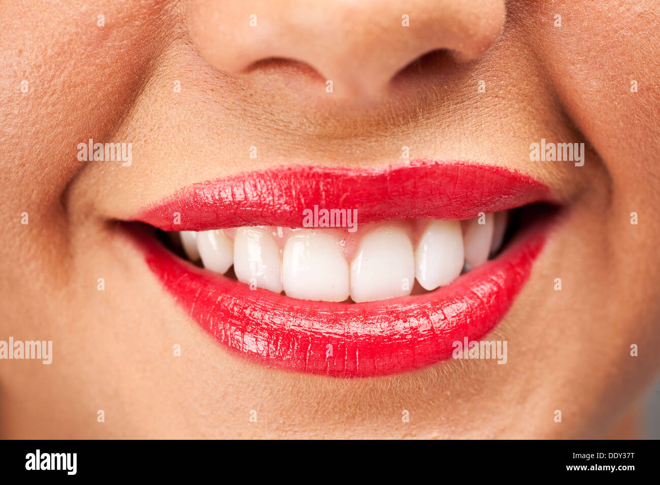 Pretty Female Models lips with teeth showing Stock Photo - Alamy