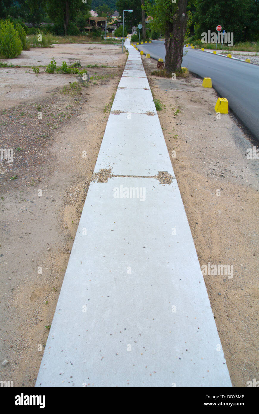 Footpath made out of concrete on an area under redevelopment Karlin ...