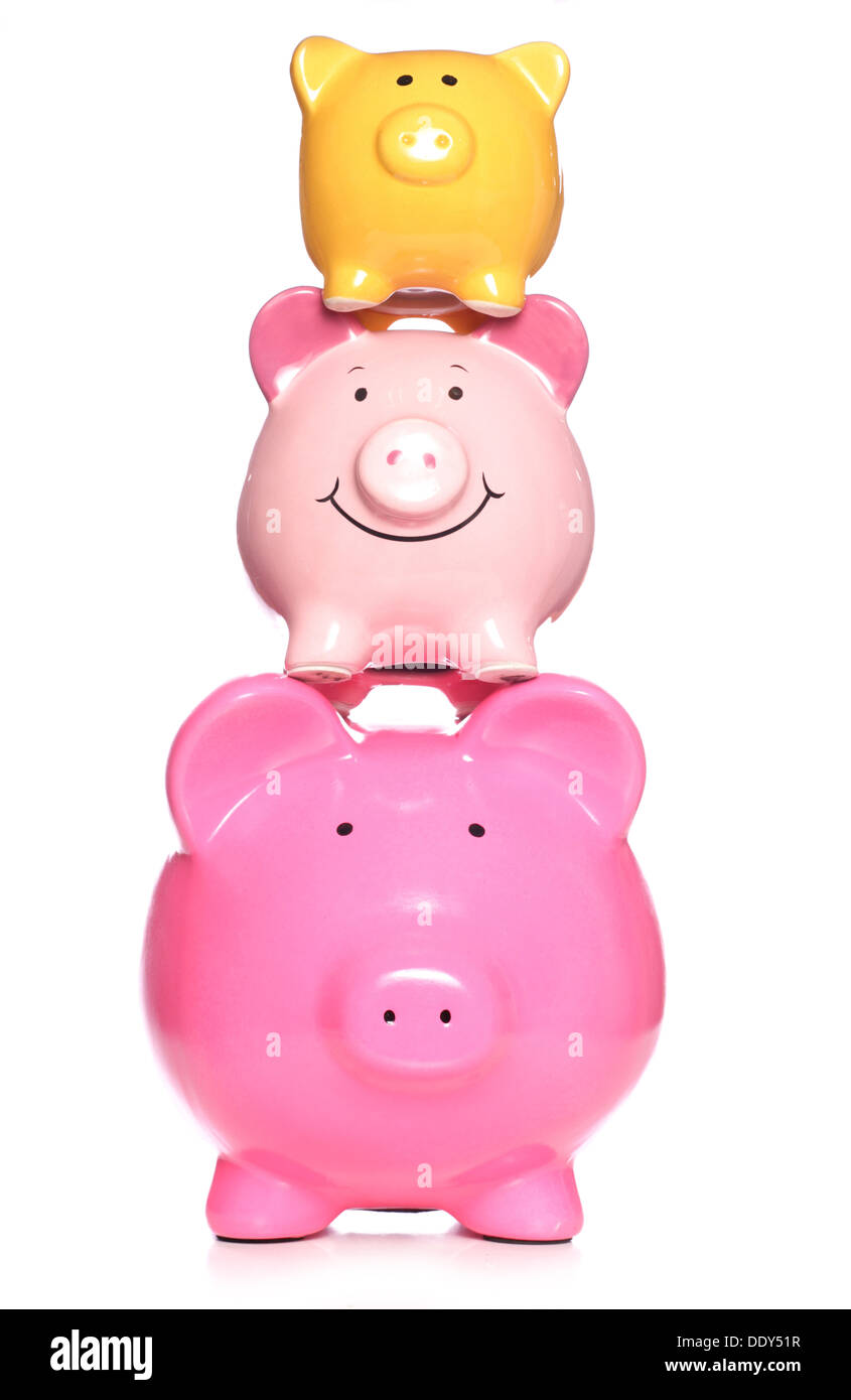 Stack of piggy banks studio cutout Stock Photo - Alamy