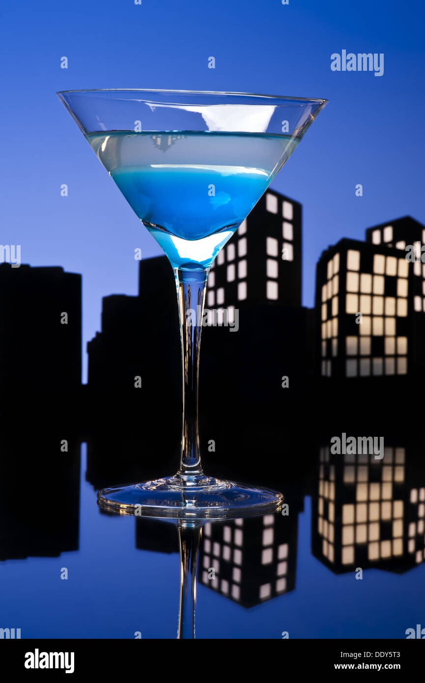 Metropolis Blue Martini cocktail in skyline setting Stock Photo - Alamy