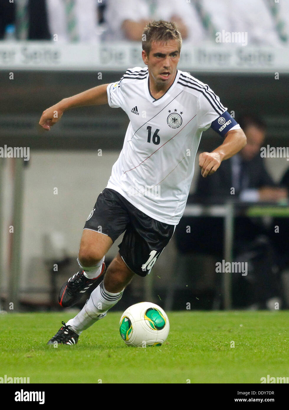 Germanys Philipp Lahm runs with the ball during the soccer match for ...