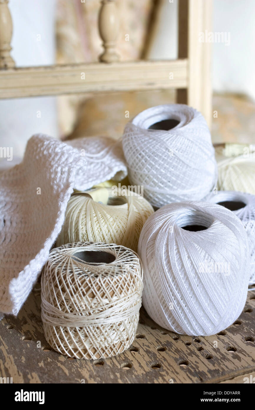 Crochet thread on an old cream-coloured chair, shabby chic Stock Photo ...