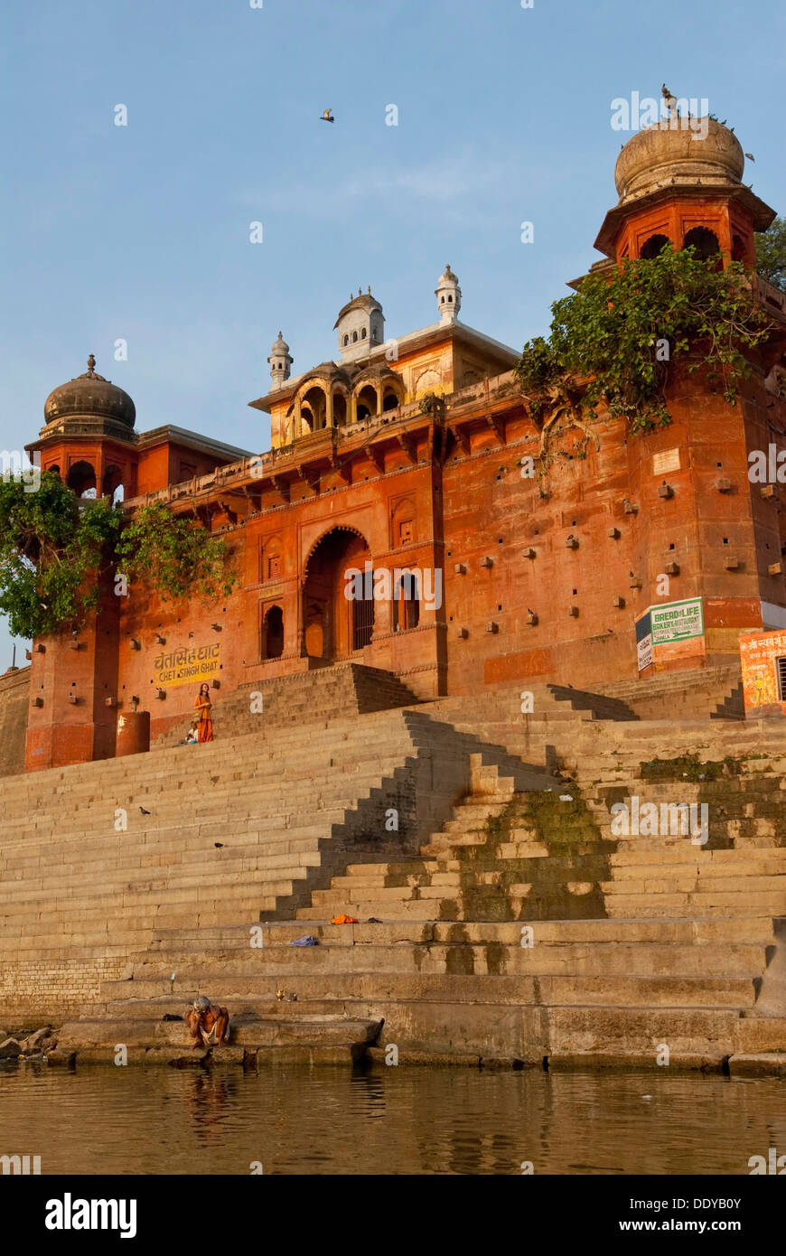 Ghat at the Ganges River at dawn, steps leading down to the river ...