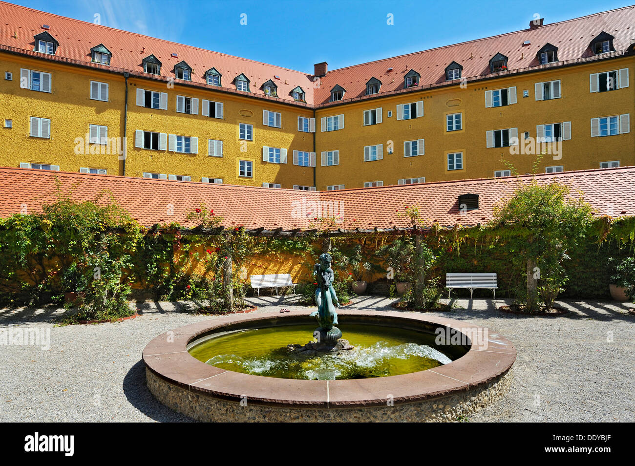 Facade with a fountain in the Borstei, a heritage protected residential ...