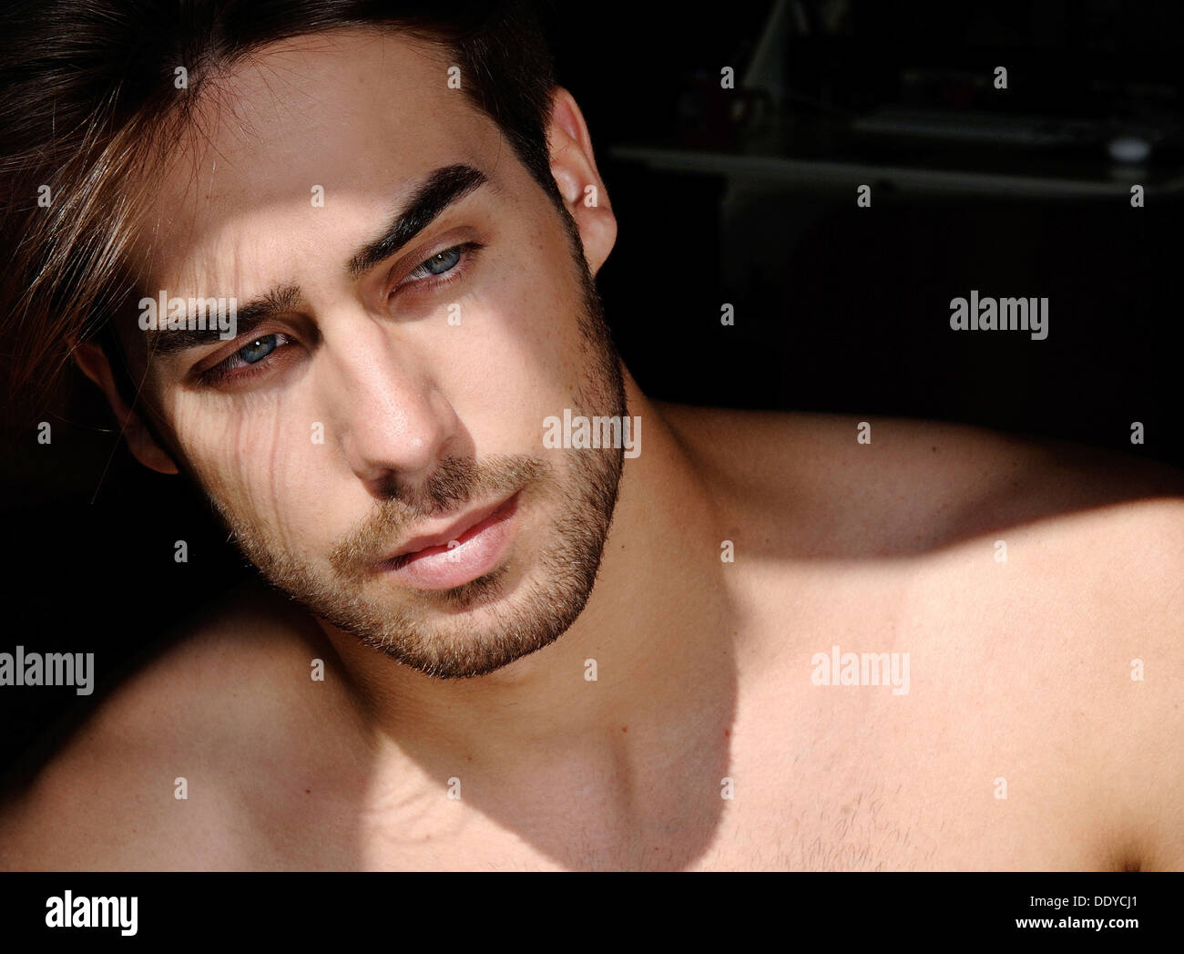 Portrait of a young man in sunlight, beauty shot Stock Photo - Alamy