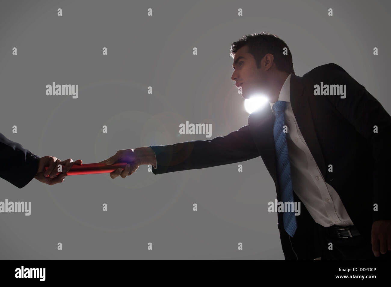 Passing the baton corporate hi-res stock photography and images - Alamy