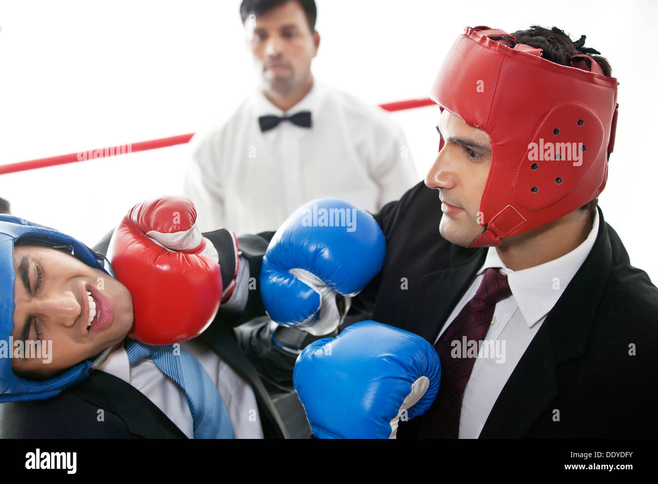 Boxer striking opponent Stock Photo - Alamy