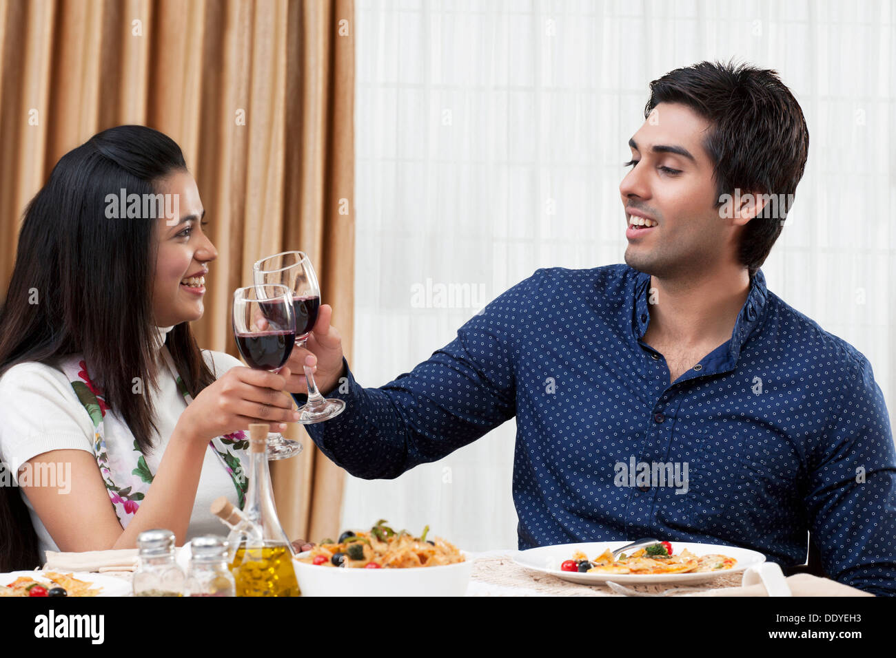 Young man woman clinking hi-res stock photography and images - Alamy
