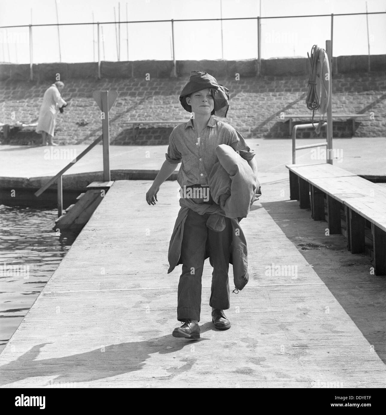 A boy on the jetty, Borstahusen, Landskrona, Sweden, 1964. Artist ...