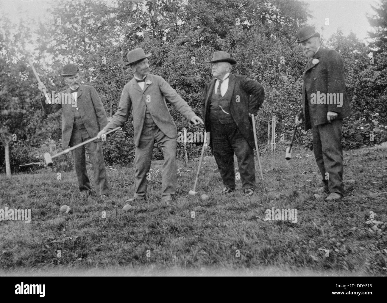Four men playing croquet. Artist: Unknown Stock Photo - Alamy