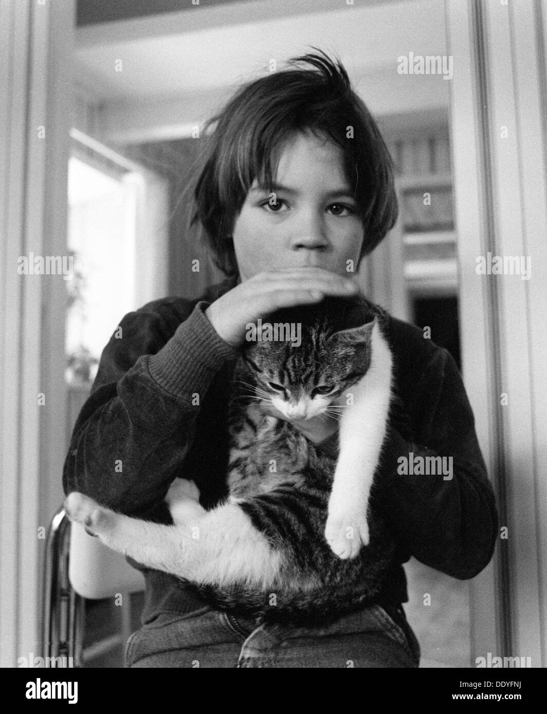 A 5 year old boy with his pet cat. Artist: Unknown Stock Photo - Alamy