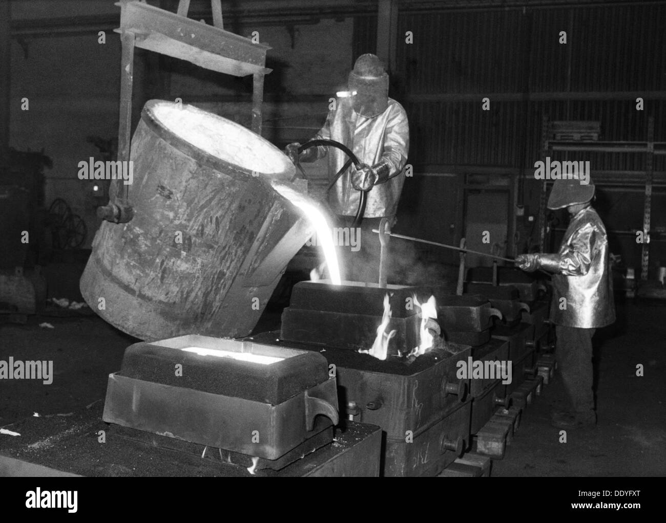 Pouring molten steel, Kockums shipyard, Malmö, Sweden, 1984. Artist ...