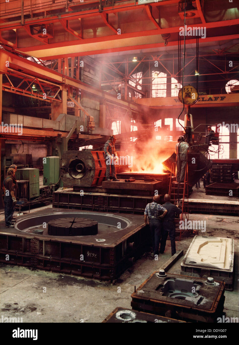 Pouring molten steel, Kockums shipyard, Malmö, Sweden, 1981. Artist ...
