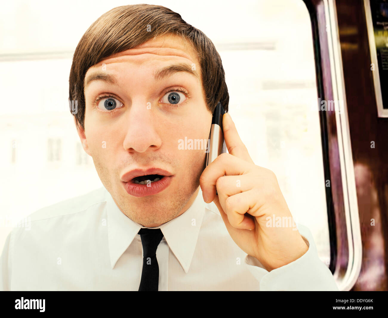 Surprised face phone hi-res stock photography and images - Alamy