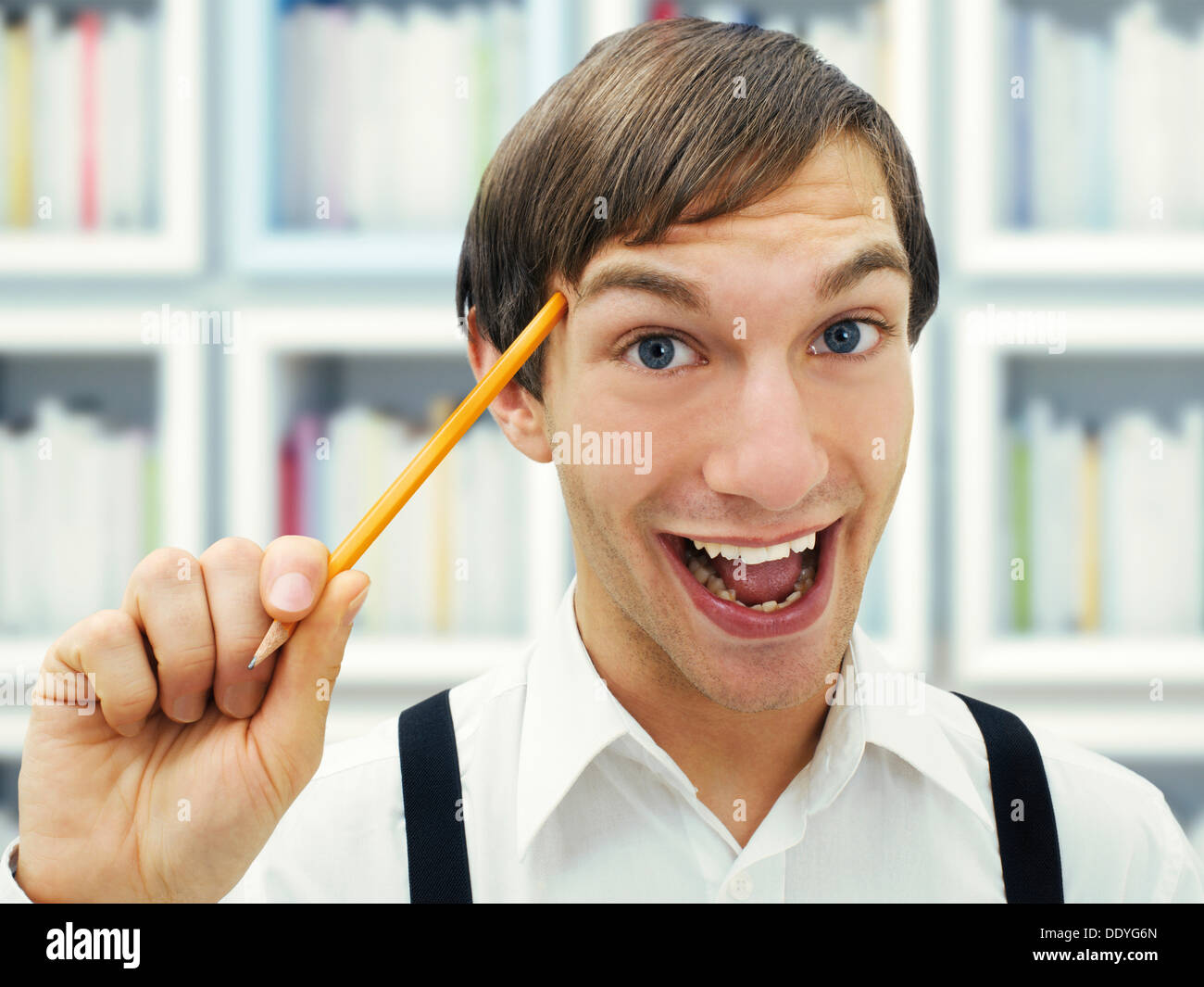 Smiling accountant, clerk standing in front of a file cabinet, hollding ...