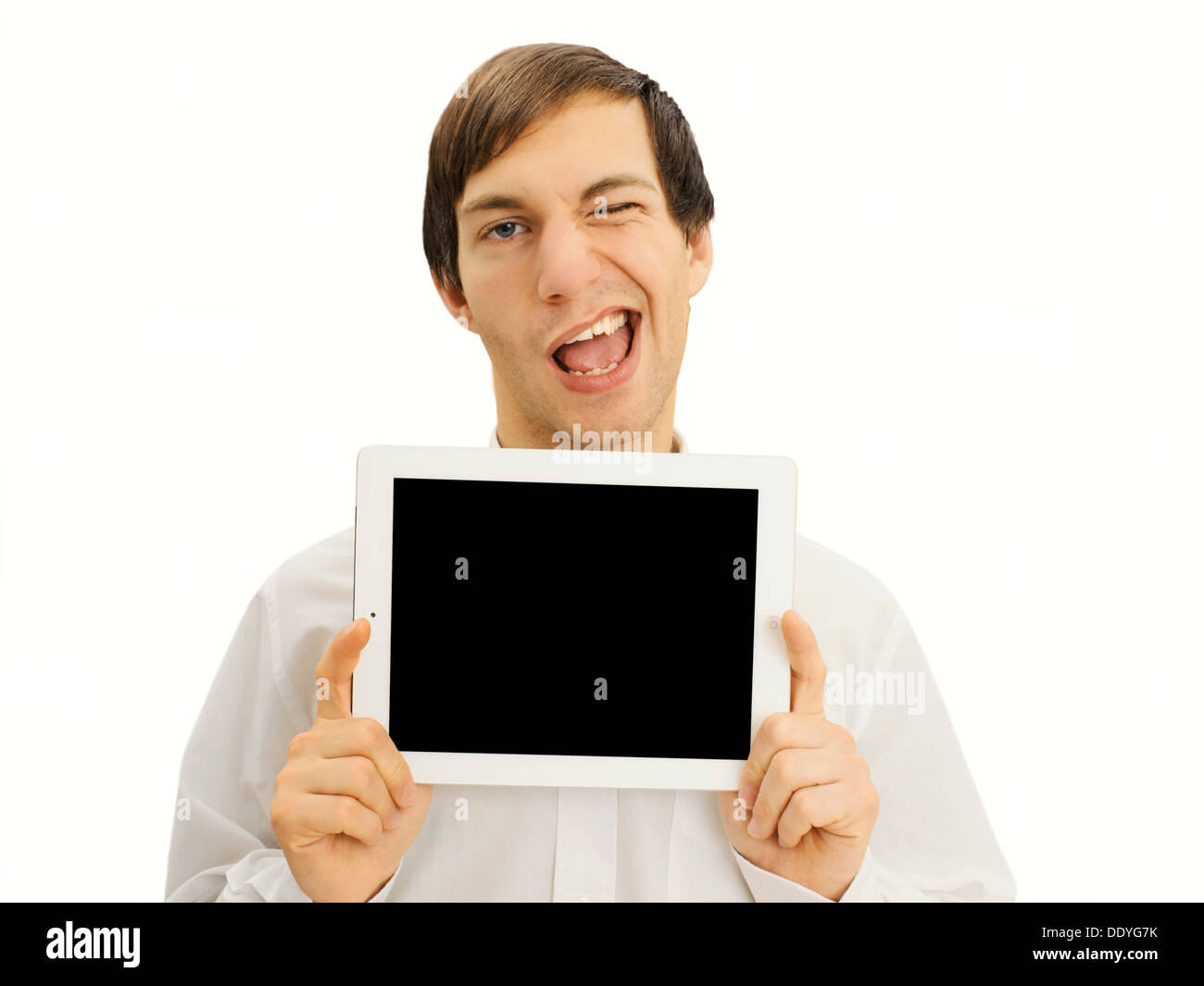 Winking man holding an iPad Stock Photo - Alamy