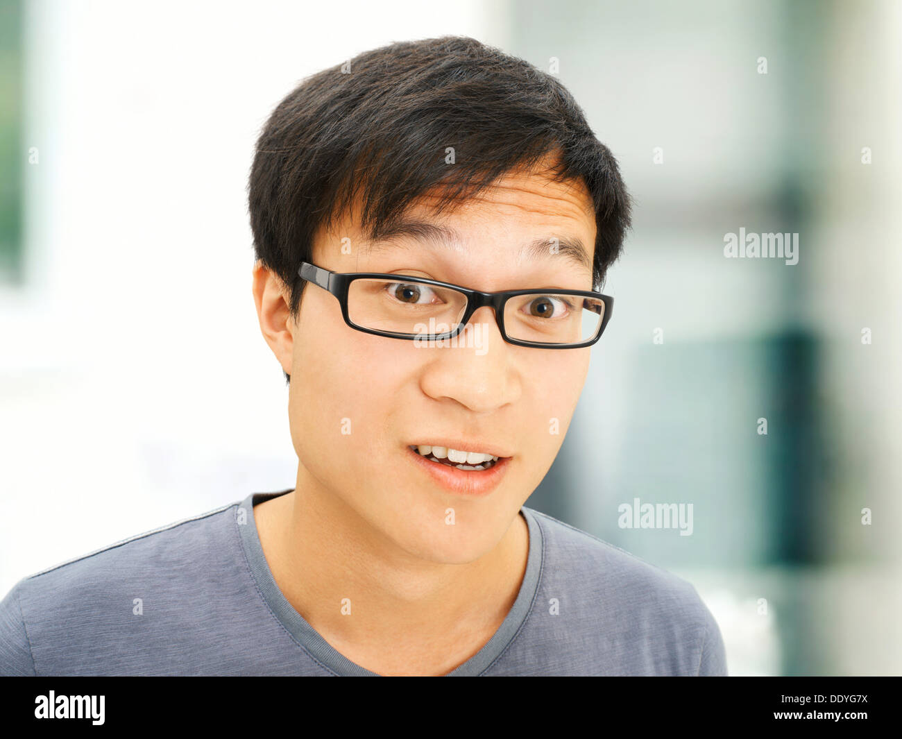 Surprised asian man hi-res stock photography and images - Alamy