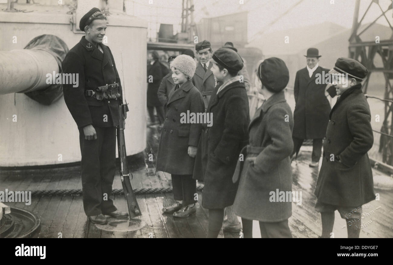 Children on board the Swedish armoured cruiser 'Fylgia' during its ...
