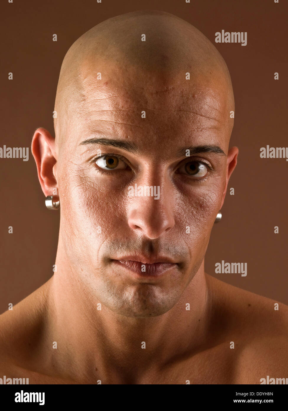 Bald man with a serious expression on his face, portrait Stock Photo ...