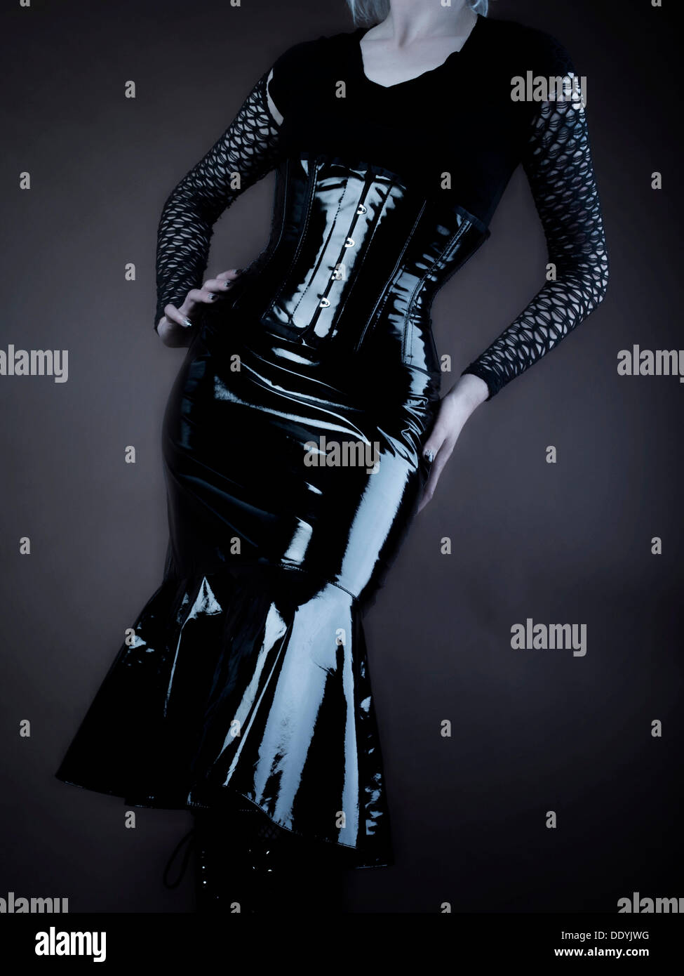 Woman, Gothic, dress, glossy vinyl dress with corset, standing Stock ...