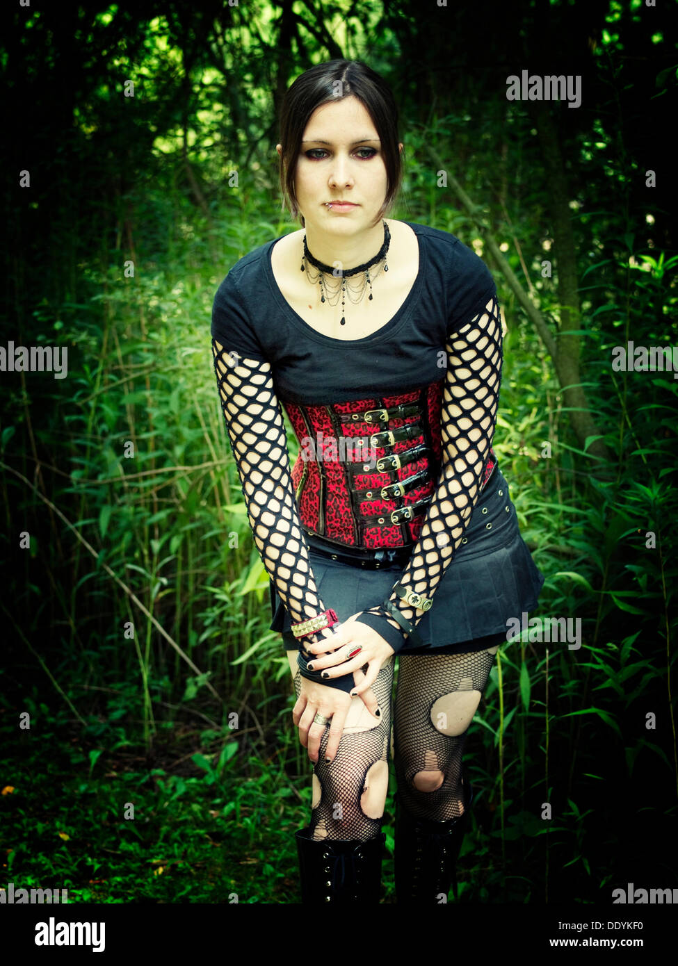 Woman gothic dark haired standing hi-res stock photography and images ...