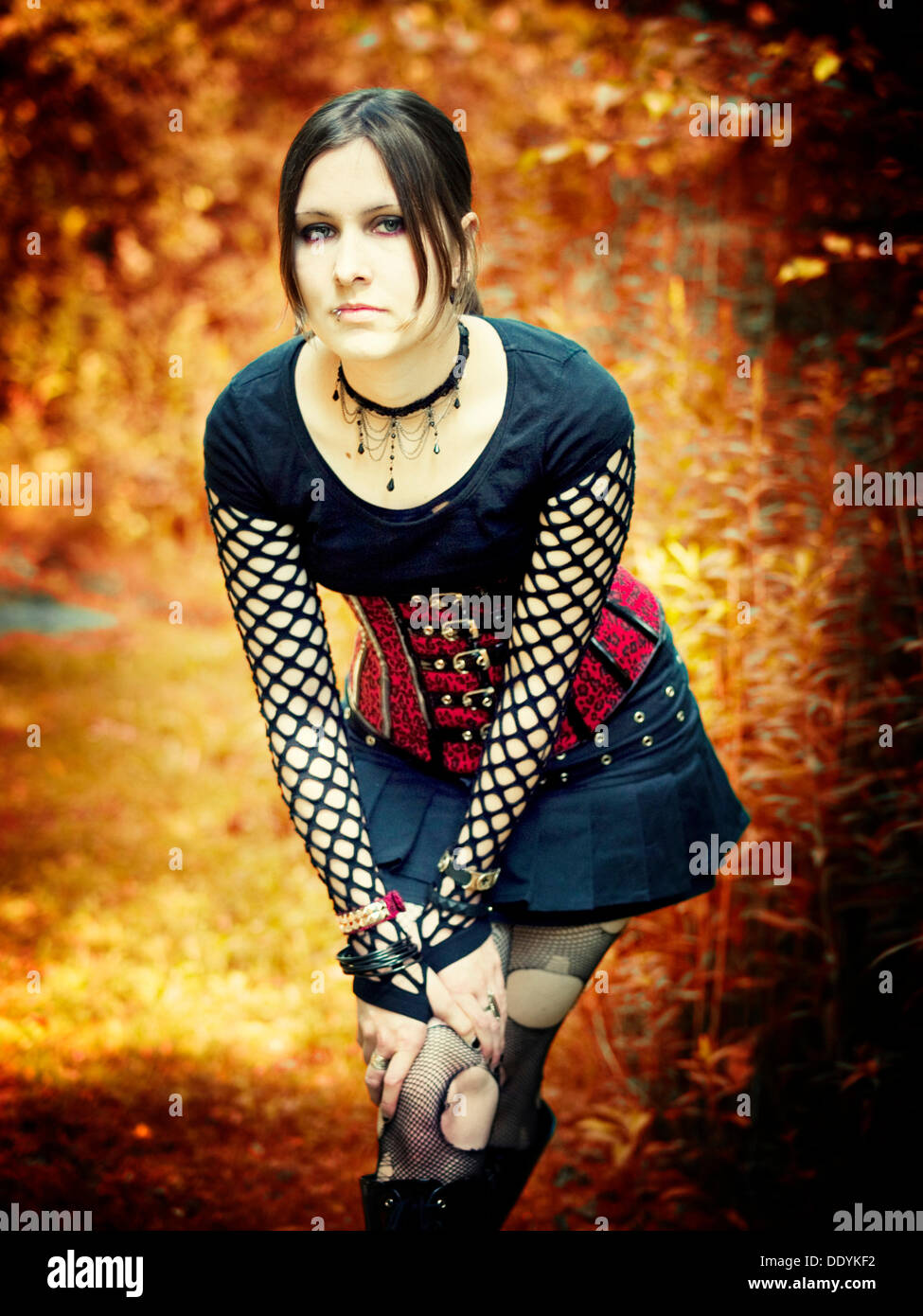 Woman gothic dark haired standing hi-res stock photography and images ...