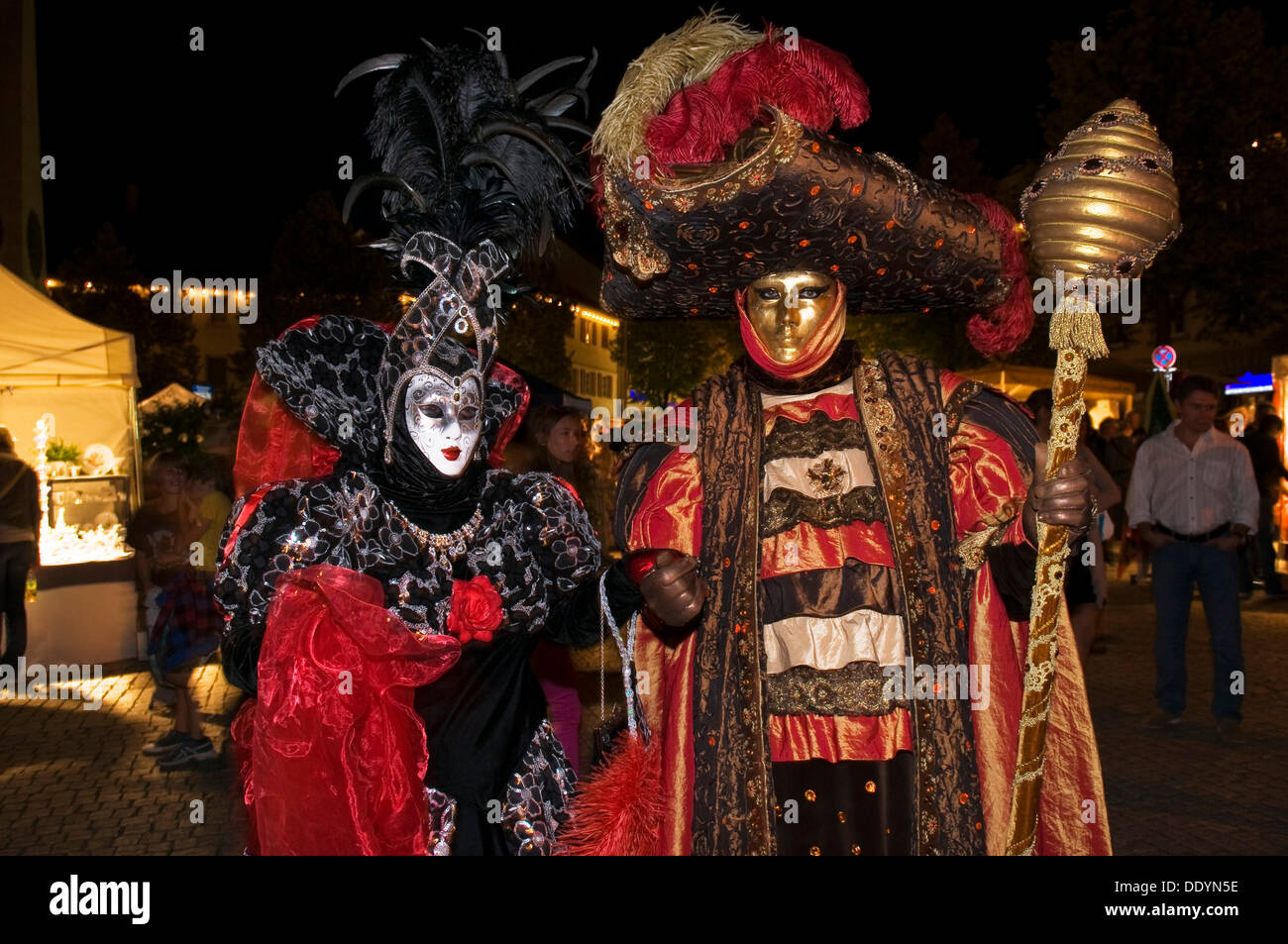 Mask wearers, Venetian Fair, on the historic Marktplatz market square ...