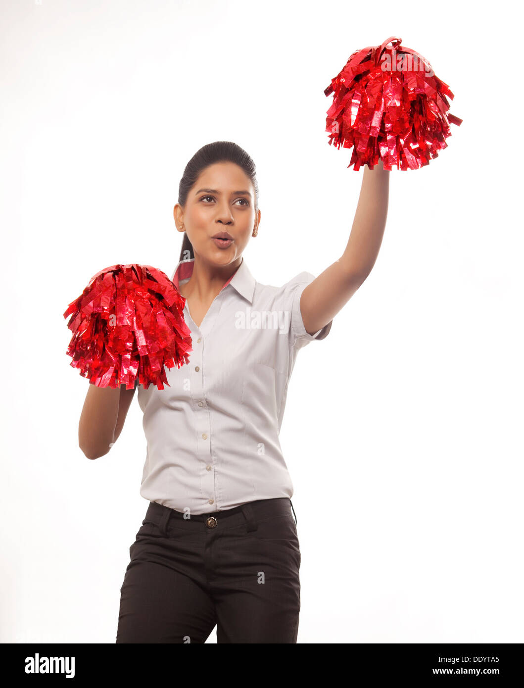 Happy cheer leader with pompoms isolated over white background Stock ...