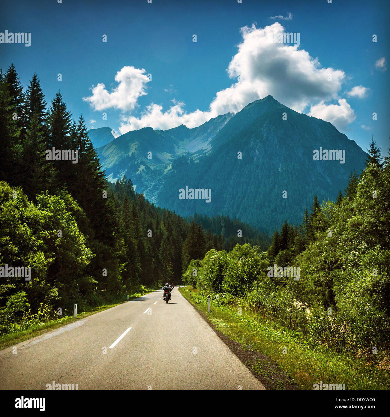 Motorcyclist riding on scenic highway hi-res stock photography and ...