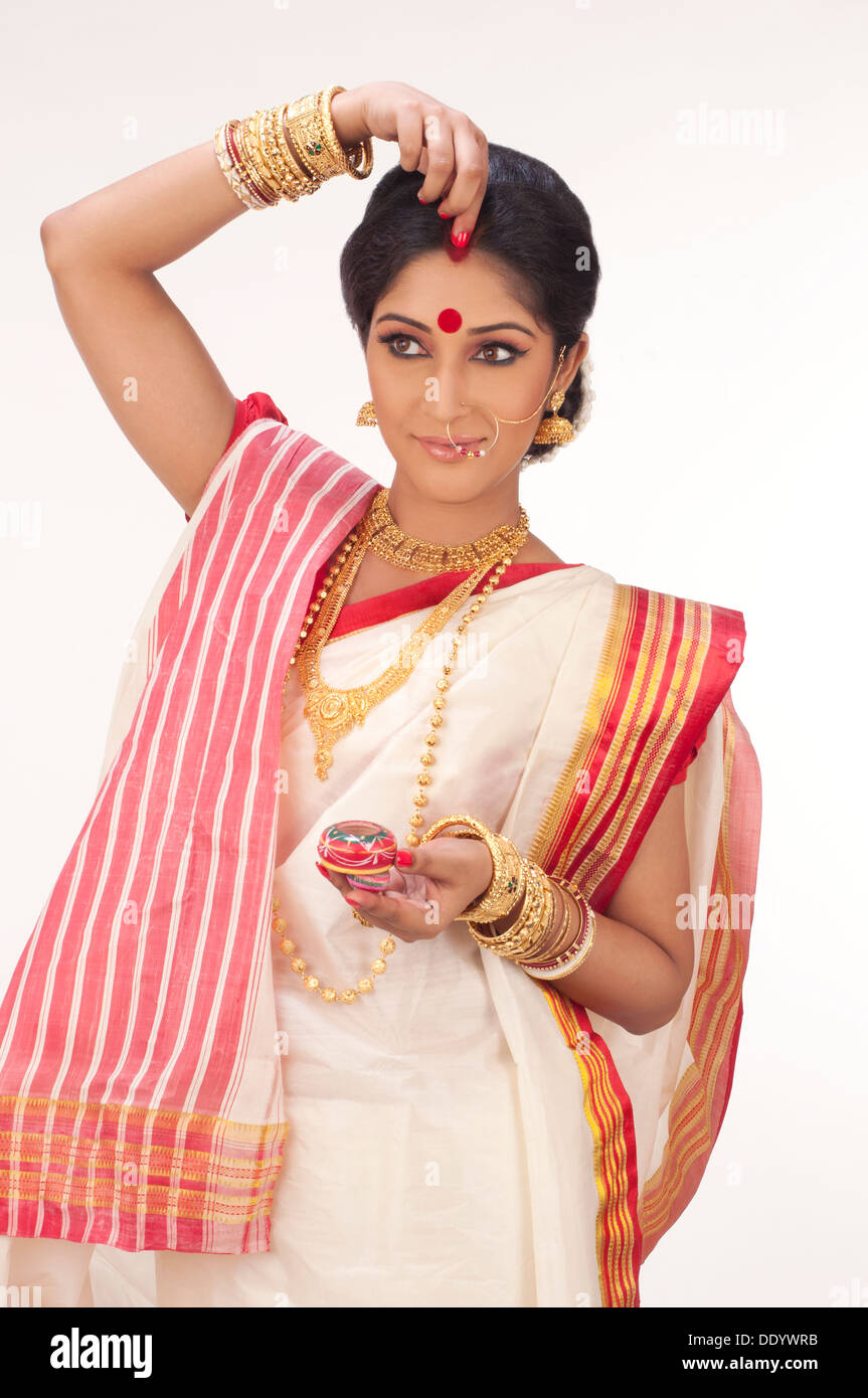 Sindoor on the forehead hi-res stock photography and images - Alamy