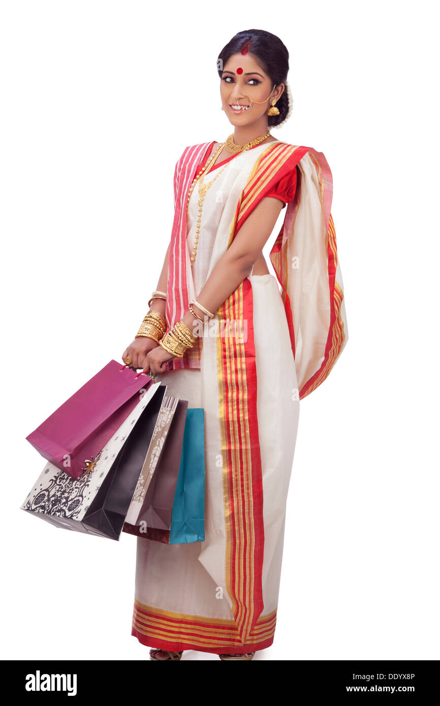 Bengali woman carrying shopping bags hi-res stock photography and ...