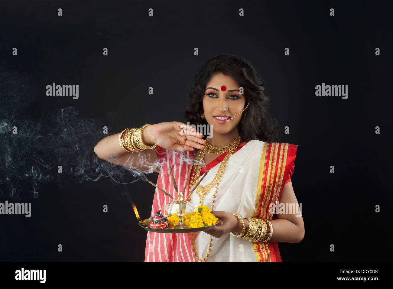 Bengali woman with a puja thali Stock Photo - Alamy