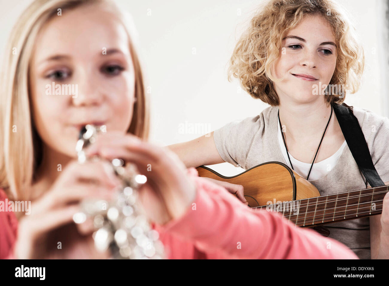 Two teenagers playing guitars hi-res stock photography and images - Alamy