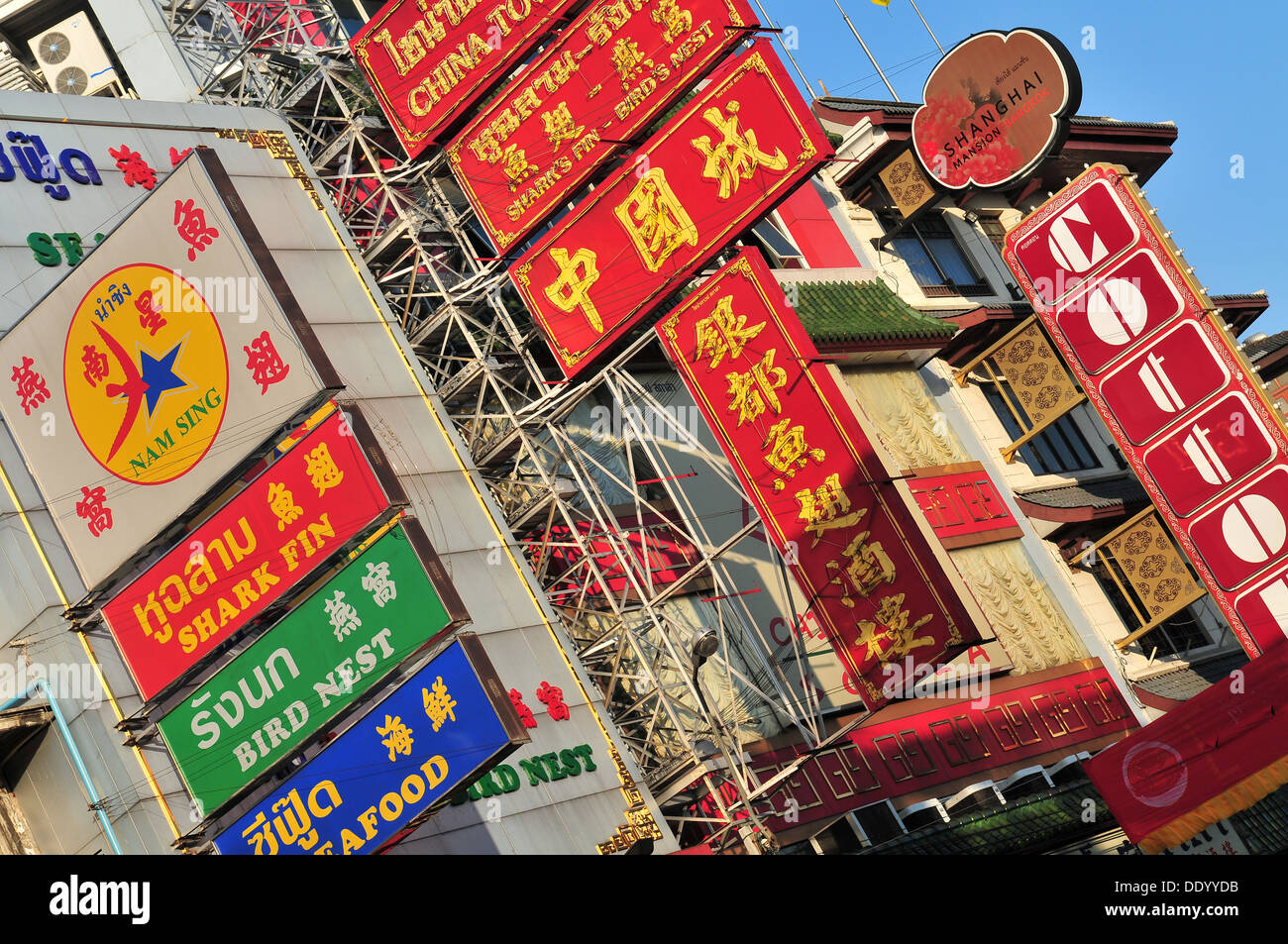 Colourful sign boards display along Yaowarat Road, Bangkok's Chinatown ...