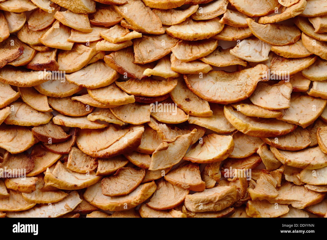 Amber Dried Apples Background Stock Photo - Alamy