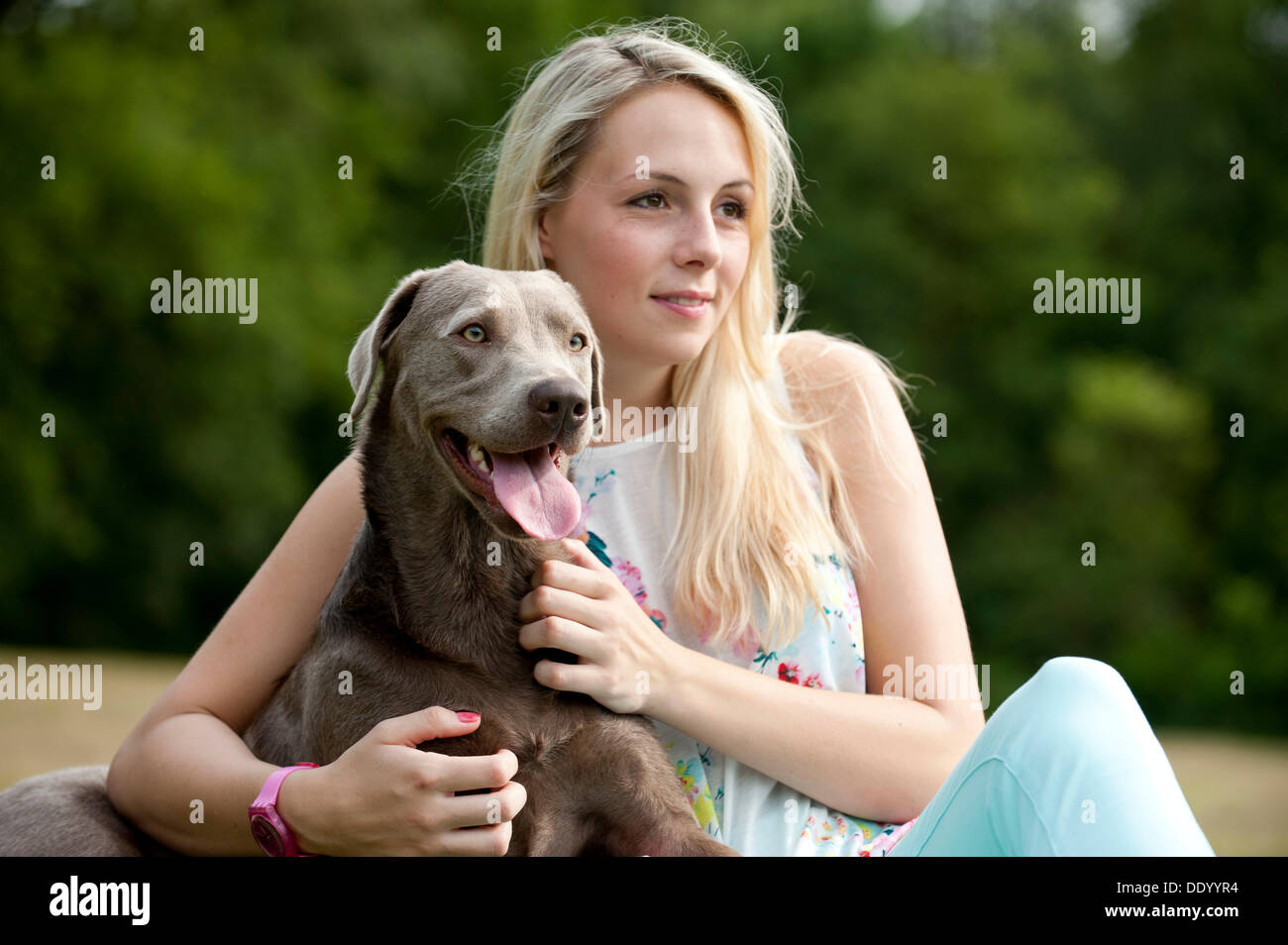 Woman with a Labrador Retriever Stock Photo - Alamy