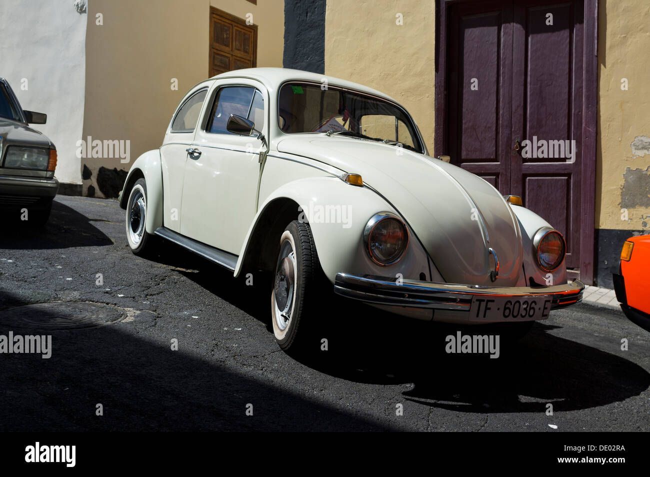 VW Beetle in white parked Stock Photo - Alamy