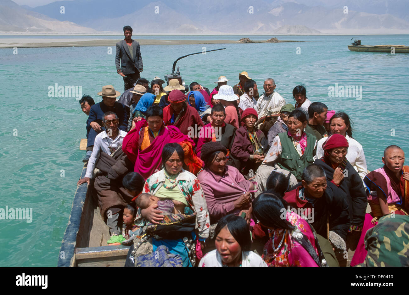 Tibetan Buddhist pilgrims in a ferry boat en route to a pilgrimage at ...