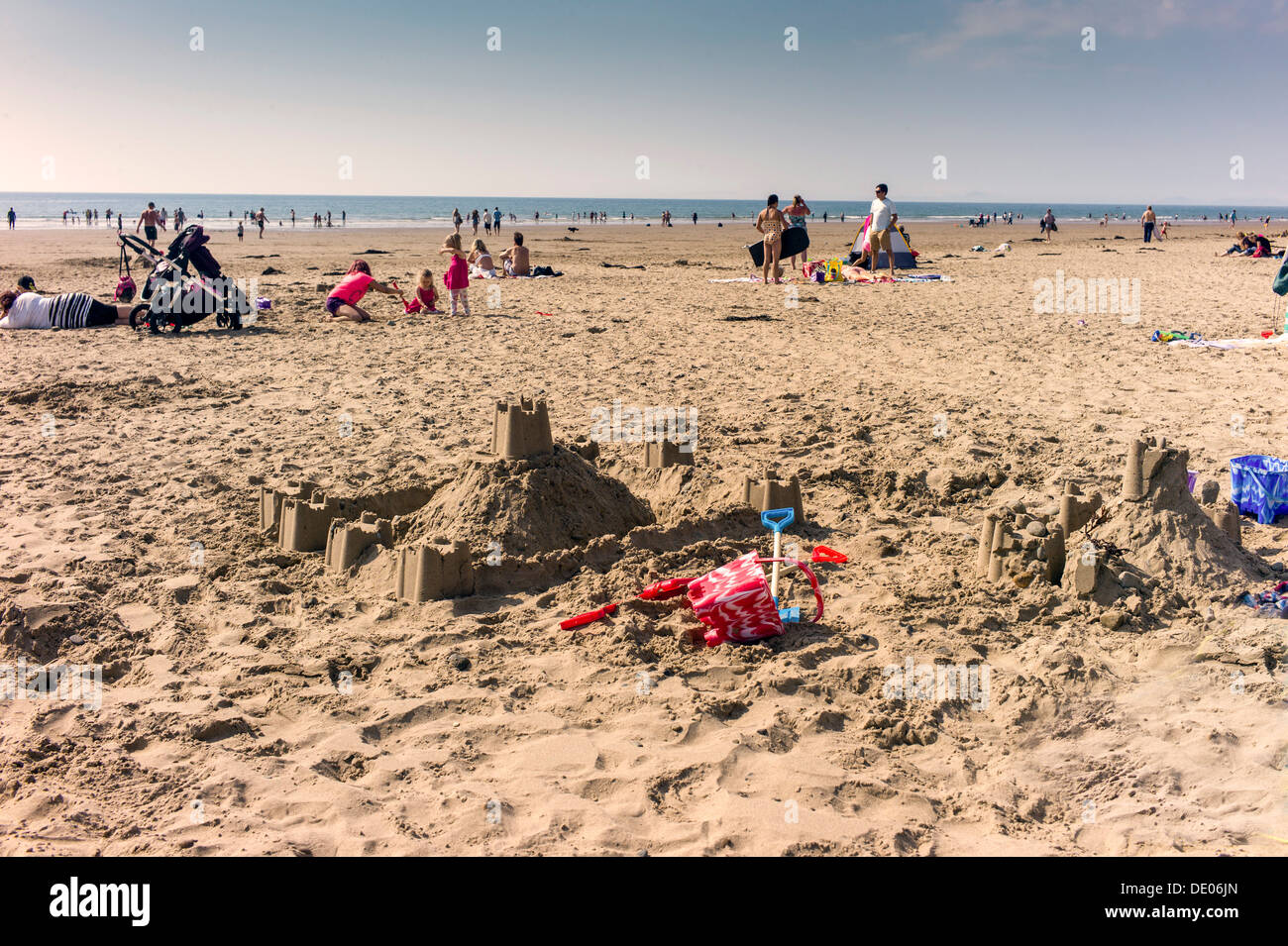 Abandoned sand castle with bucket and spades hi-res stock photography ...
