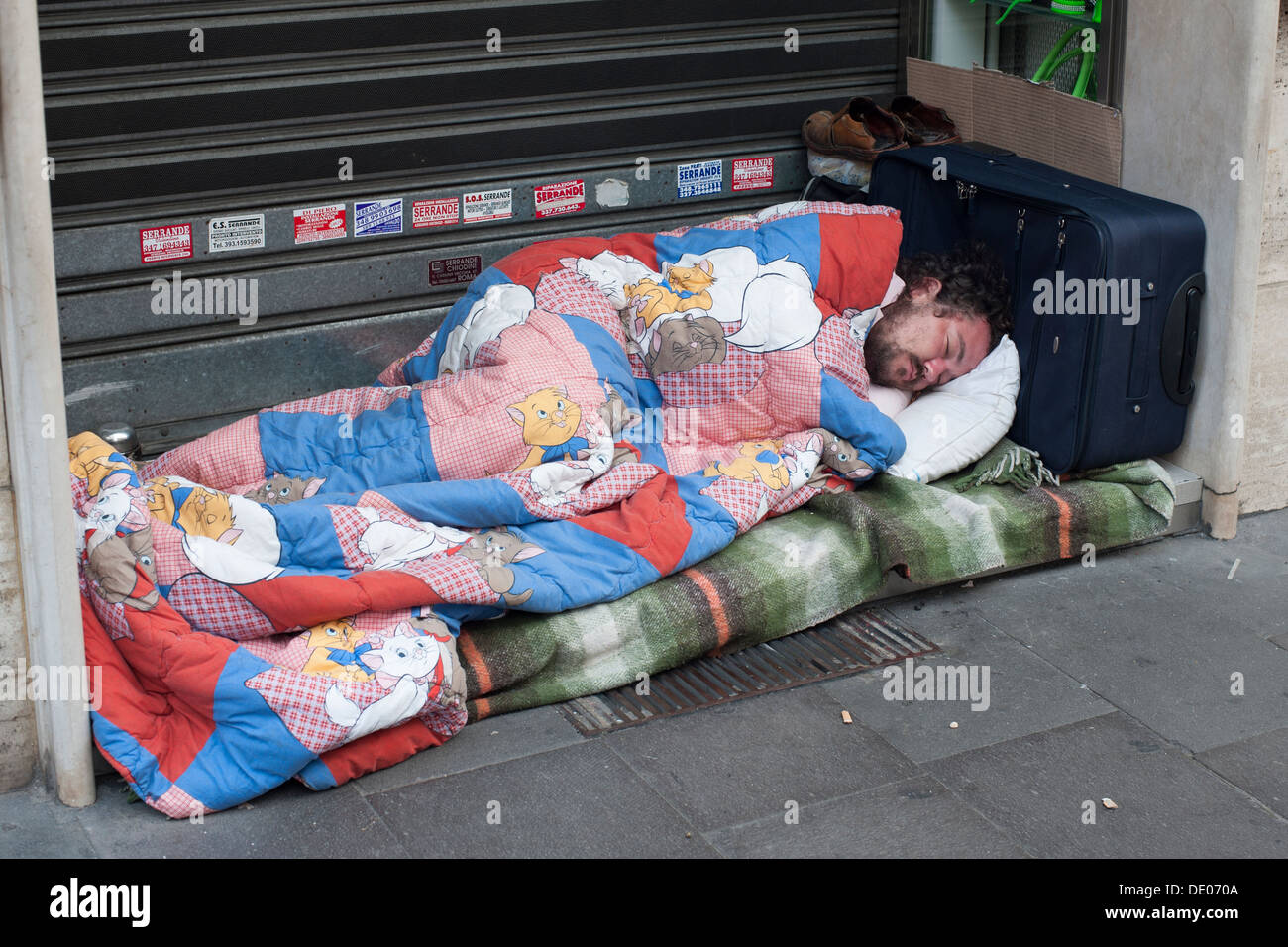 Homeless on the streets of Rome Stock Photo - Alamy