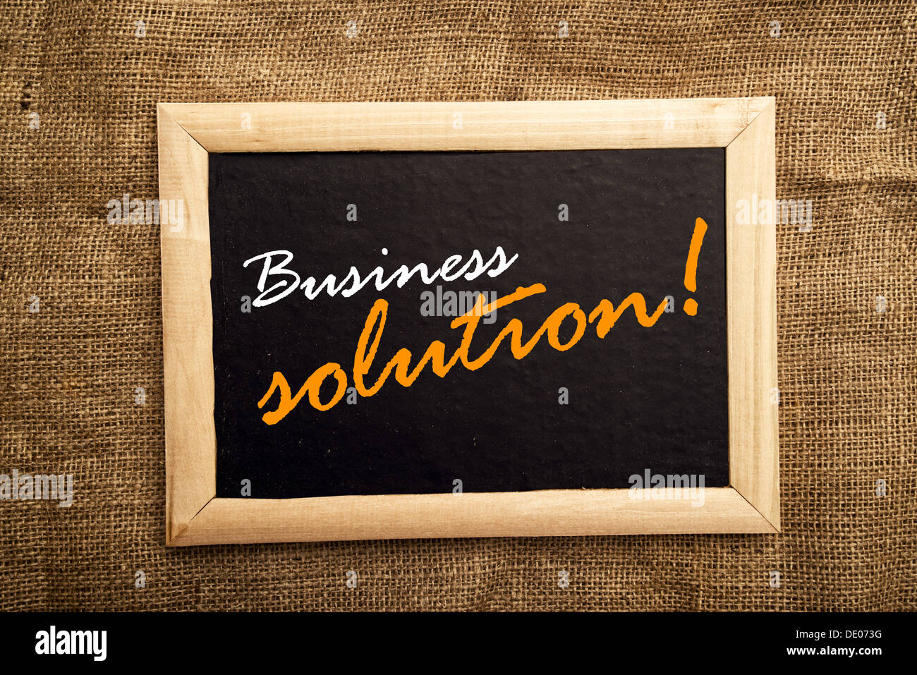 Business solution, message on blackboard. Business badge Stock Photo ...