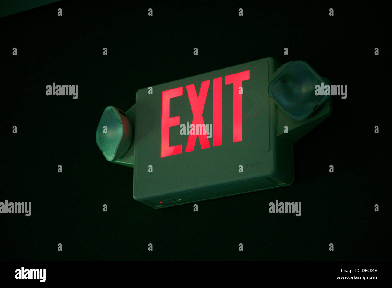 Illuminated Exit sign in a restaurant, USA Stock Photo - Alamy