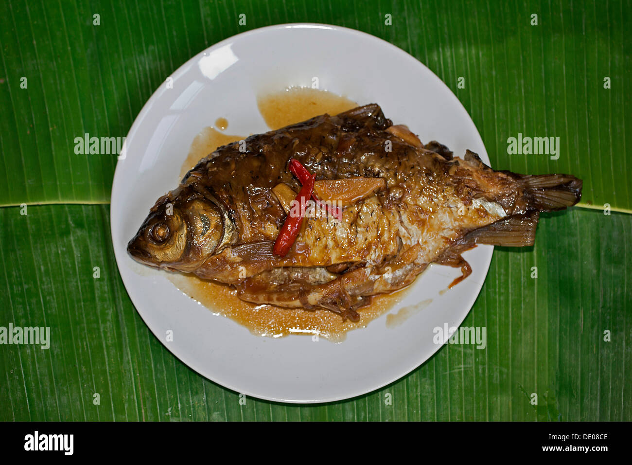 Braised Thai-style carp Stock Photo - Alamy